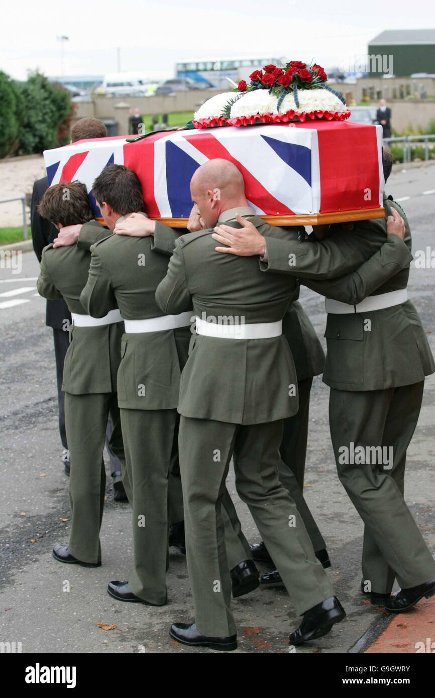 Colleagues carry the coffin at the funeral of Lance Corporal Gordon ...