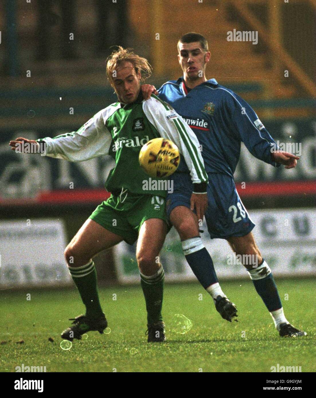 Halifax Town's Stuart Parnaby challenges Plymouth Argyle's Paul ...
