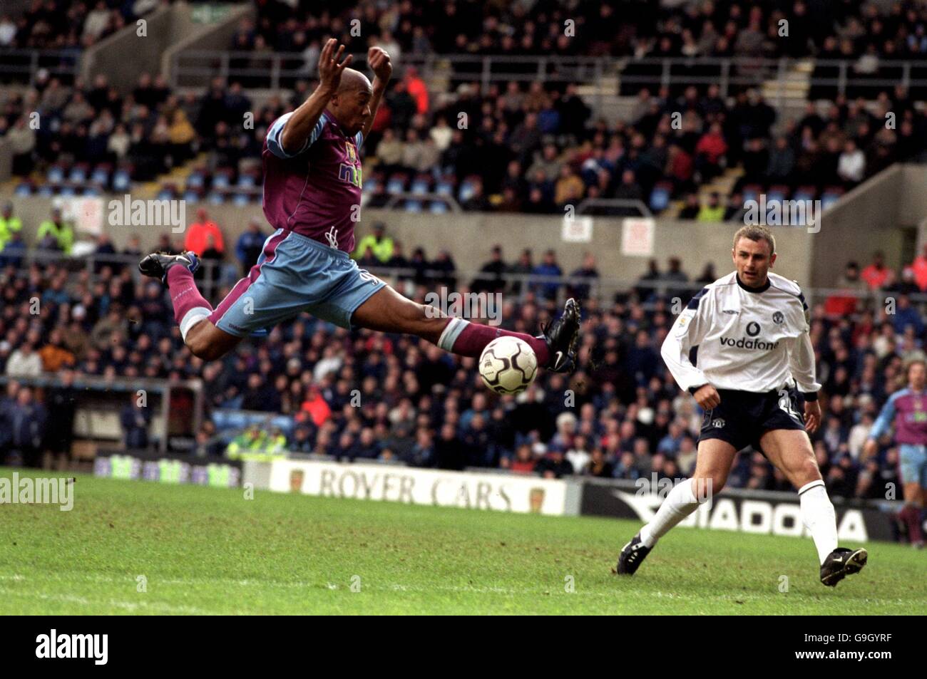 (L-R) Aston Villa's Dion Dublin beats Manchester United's Ronnie ...