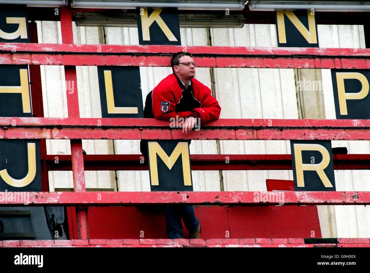 The scoreboard operator watches Sunderland's last ever match at Roker ...