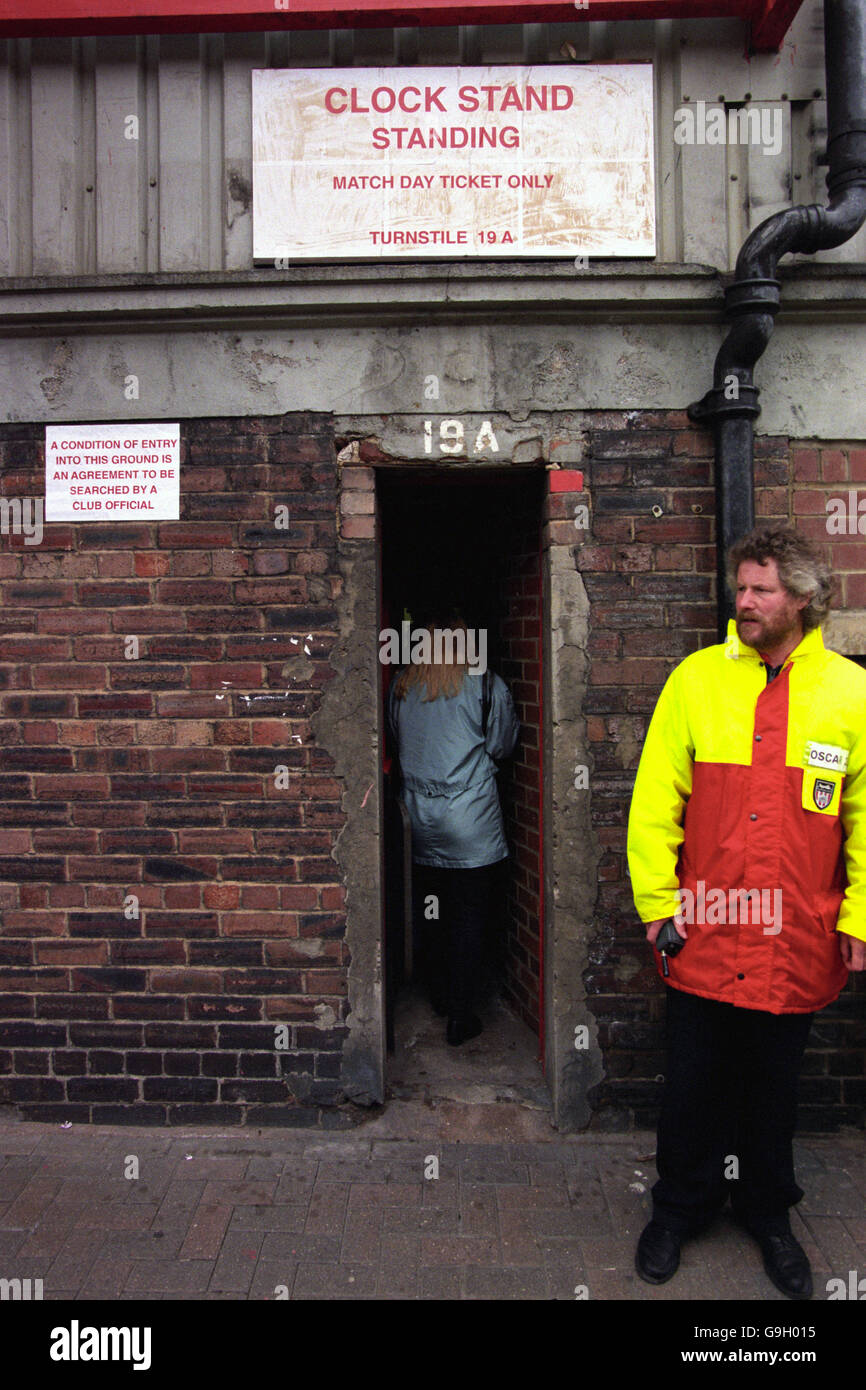 A Sunderland fan squeezes through the tiny antiquated turnstile for the ...