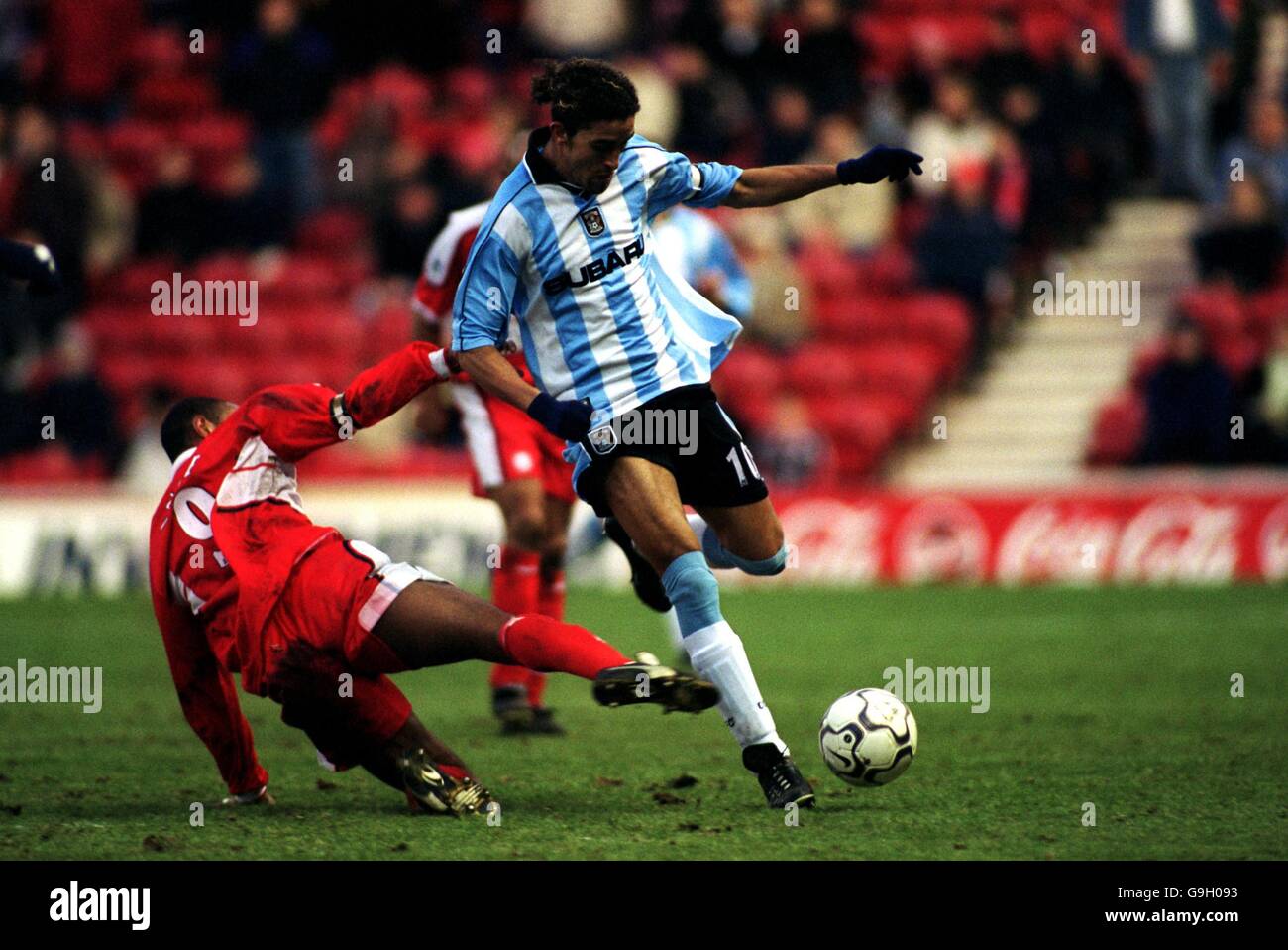 Middlesbrough's Paul Ince tackles Coventry's Mustapha Hadji Stock Photo ...