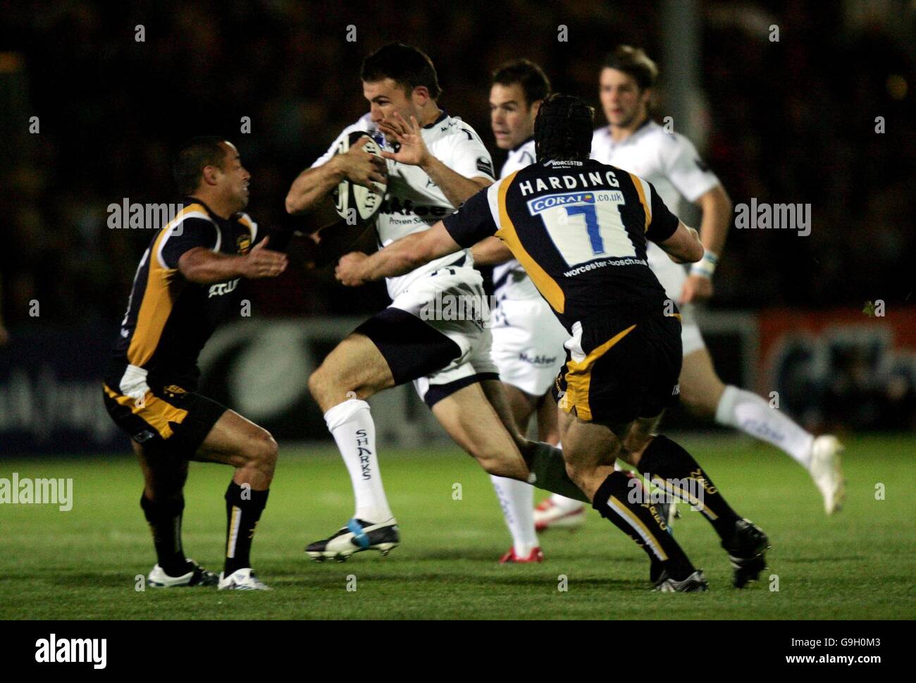 Chris Bell of Sale charges into Shane Drahm (left) and Tom Harding of ...