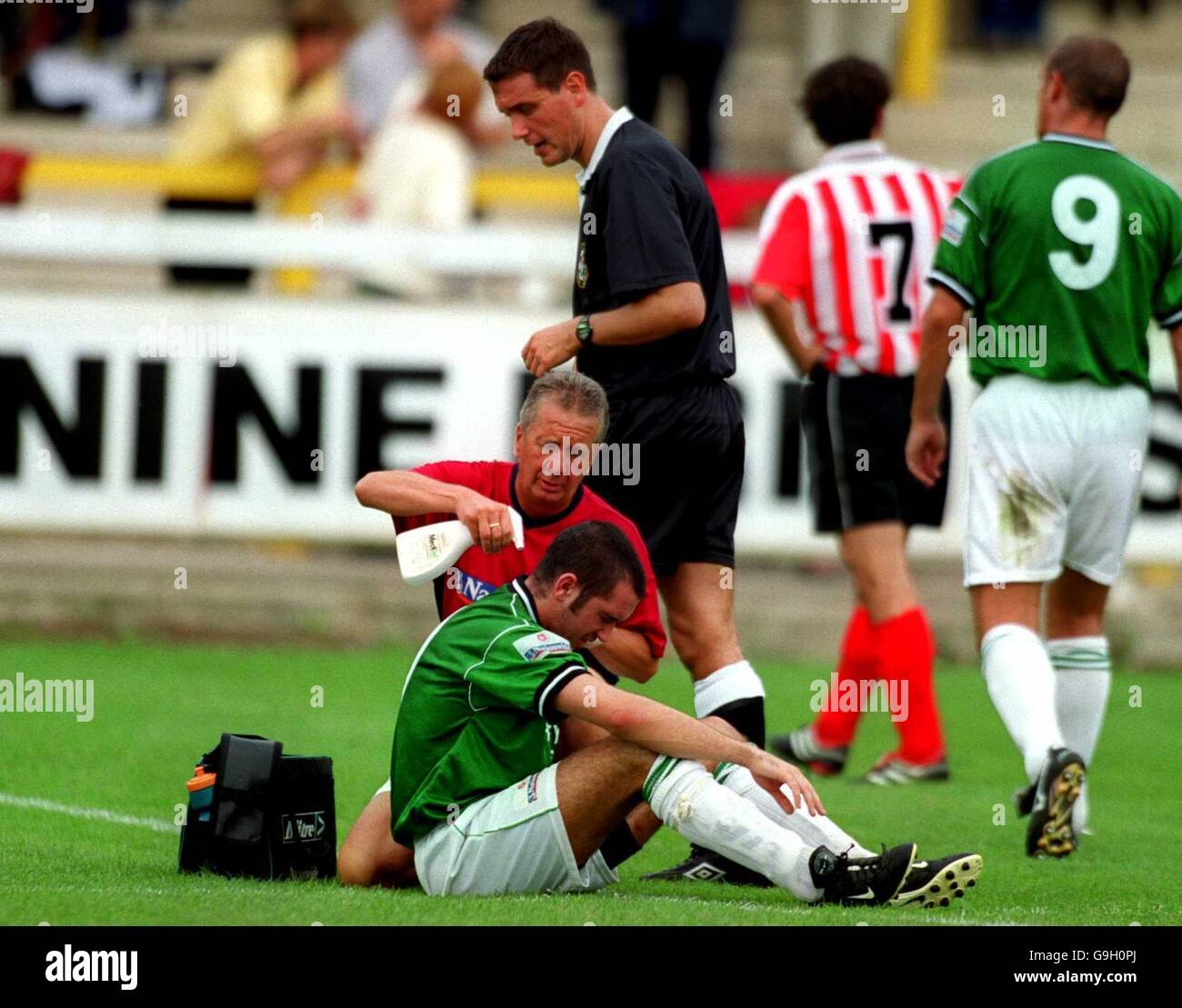 Northwich Victoria's Gary Fletcher receives treatment from the physio ...