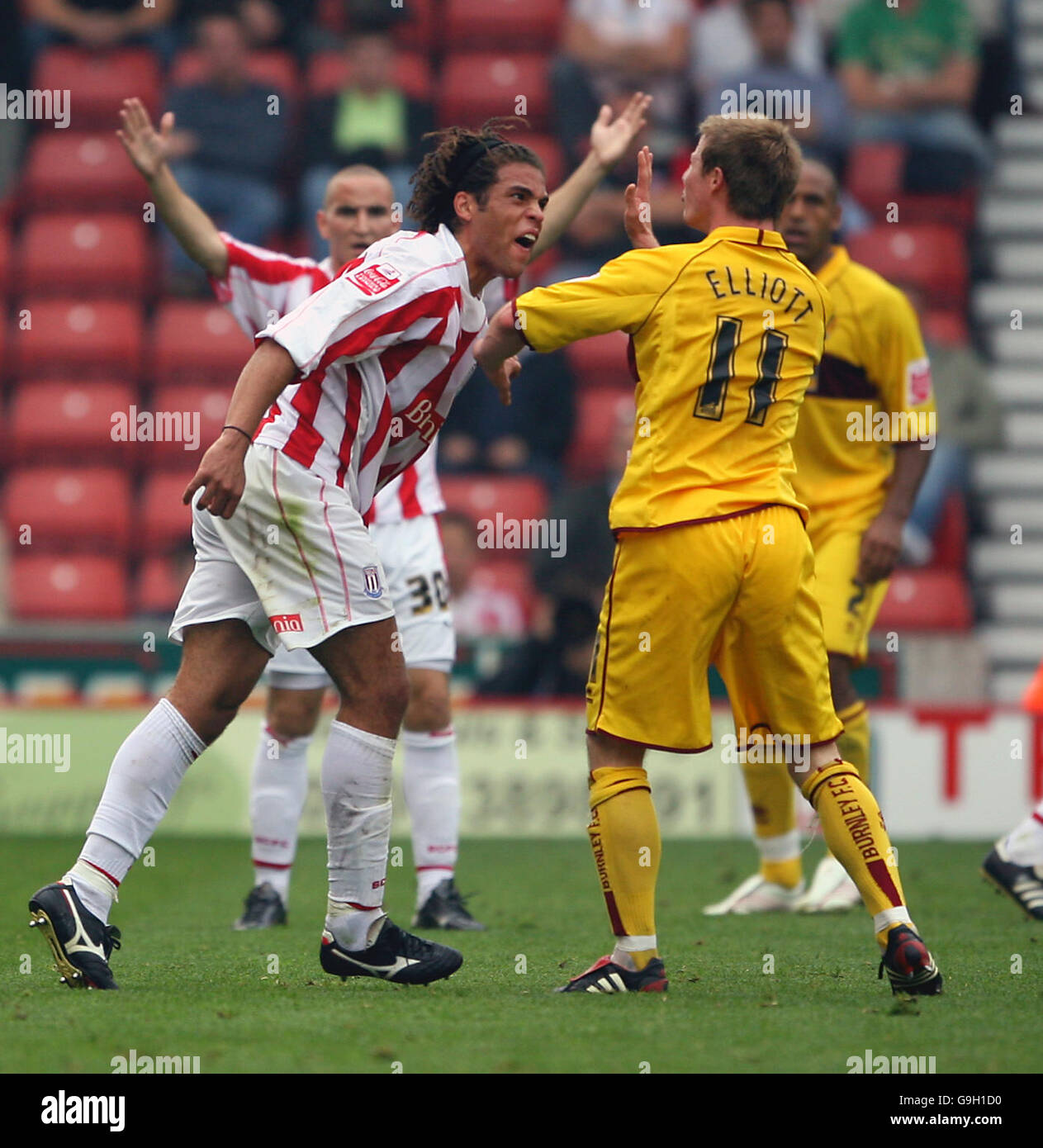 Stoke City's Darel Russell squares up to Burnley's Wade Elliott Stock ...