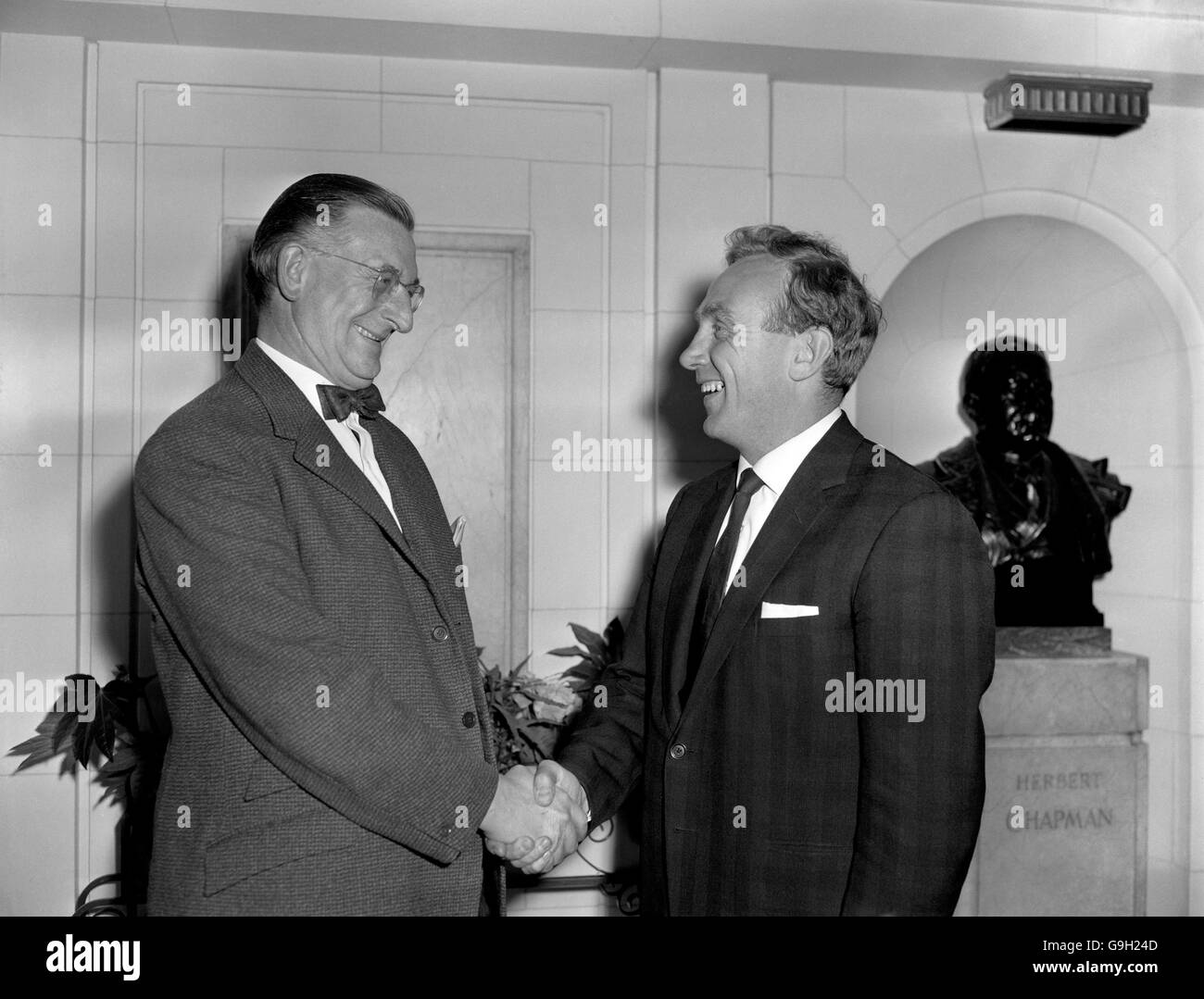 (L-R) Arsenal secretary Bob Wall welcomes new manager Billy Wright to ...