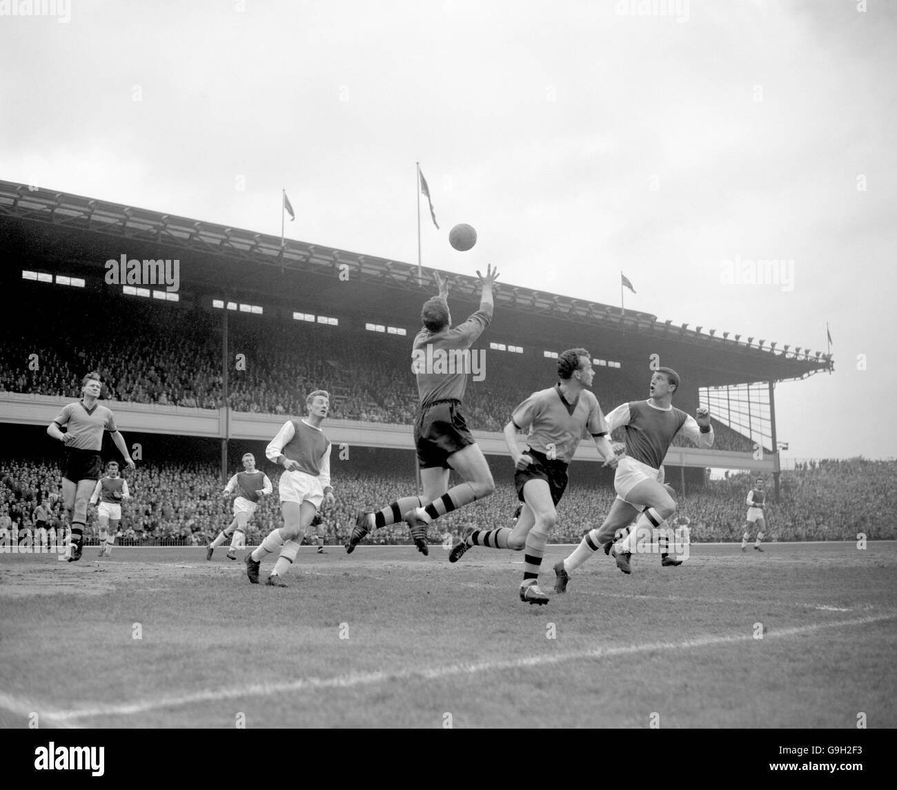 Wolverhampton Wanderers goalkeeper Malcolm Finlayson (third r) rises to ...