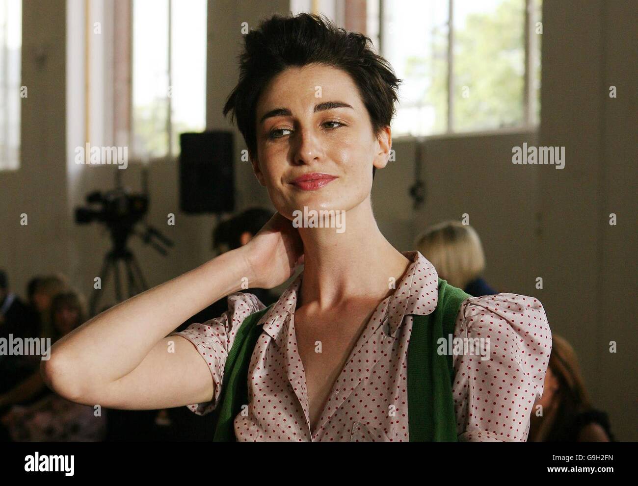 Model Erin O'Connor waits for the Jonathan Saunders show during the ...