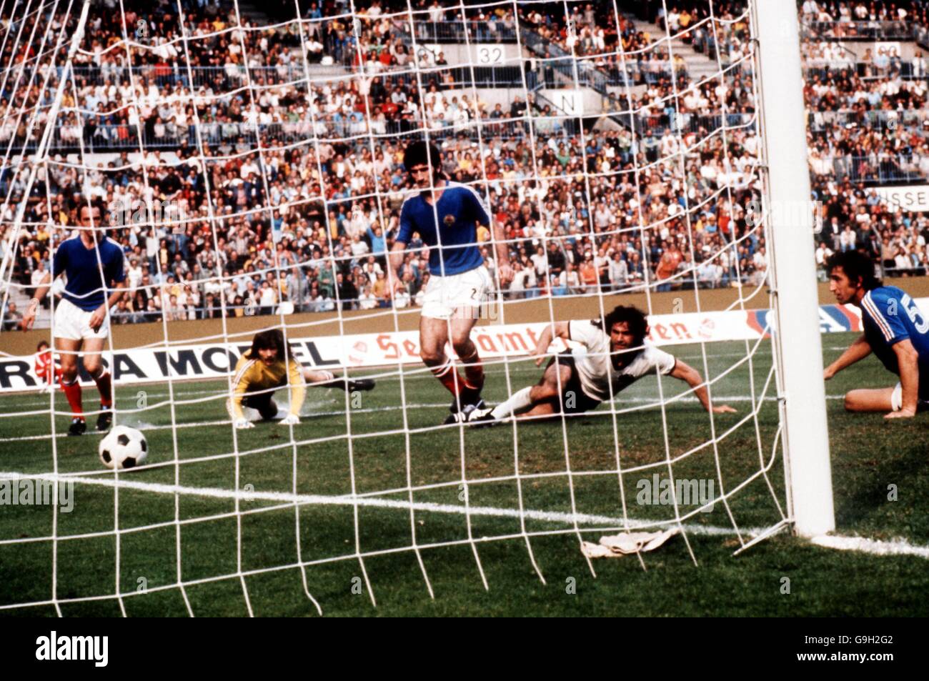 West Germany's Gerd Muller (second l) gets between Yugoslavia's Ivan ...