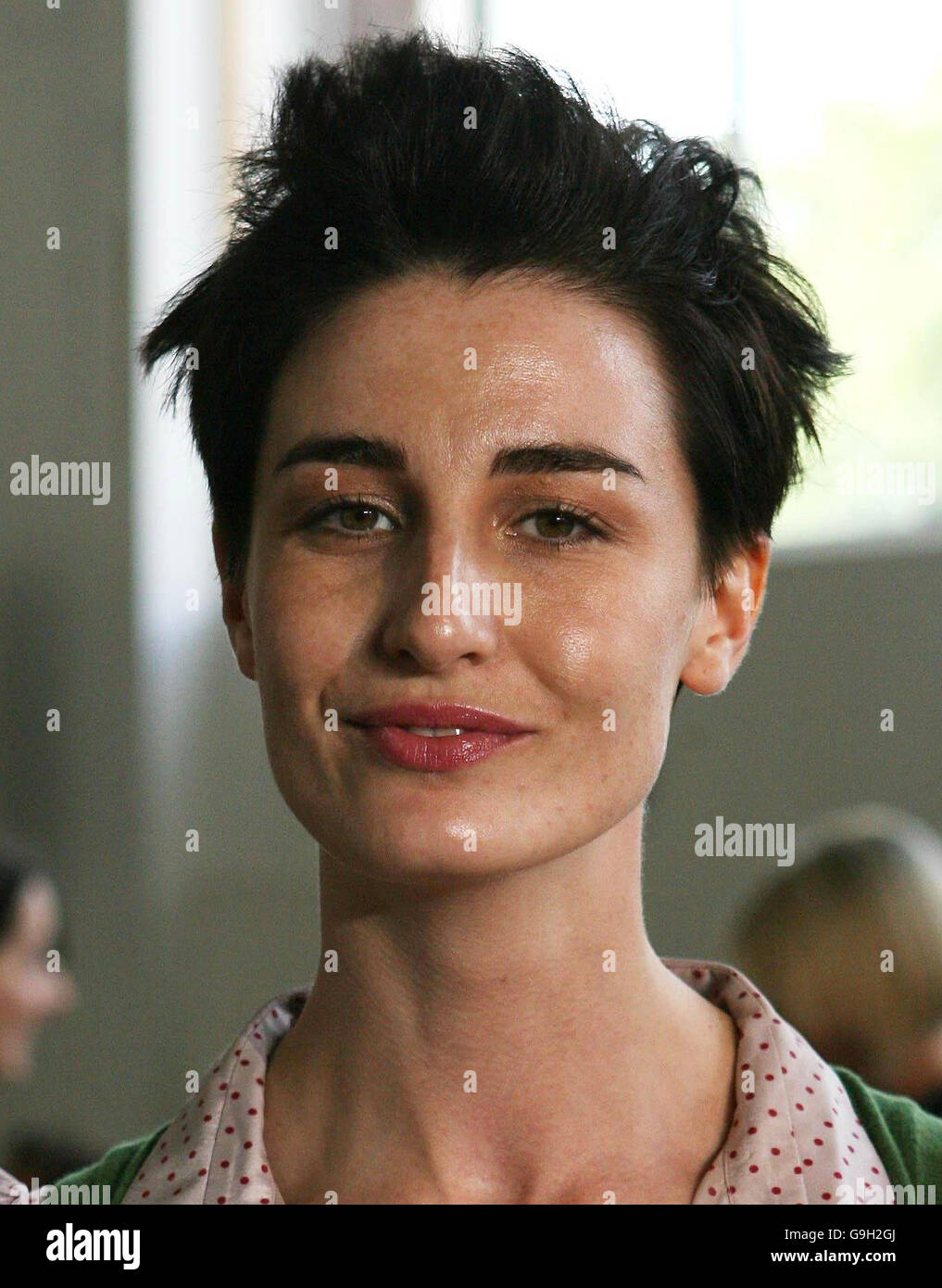 Model Erin O'Connor waits for the Jonathan Saunders show during the ...