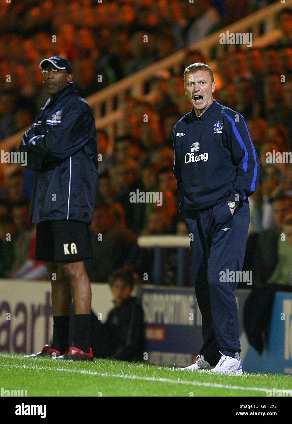 Peterborough United's Keith Alexander (r) looks on as Everton manager ...