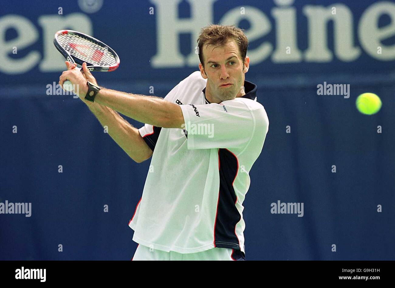 Greg Rusedski of England in action during his victory against Marcos ...