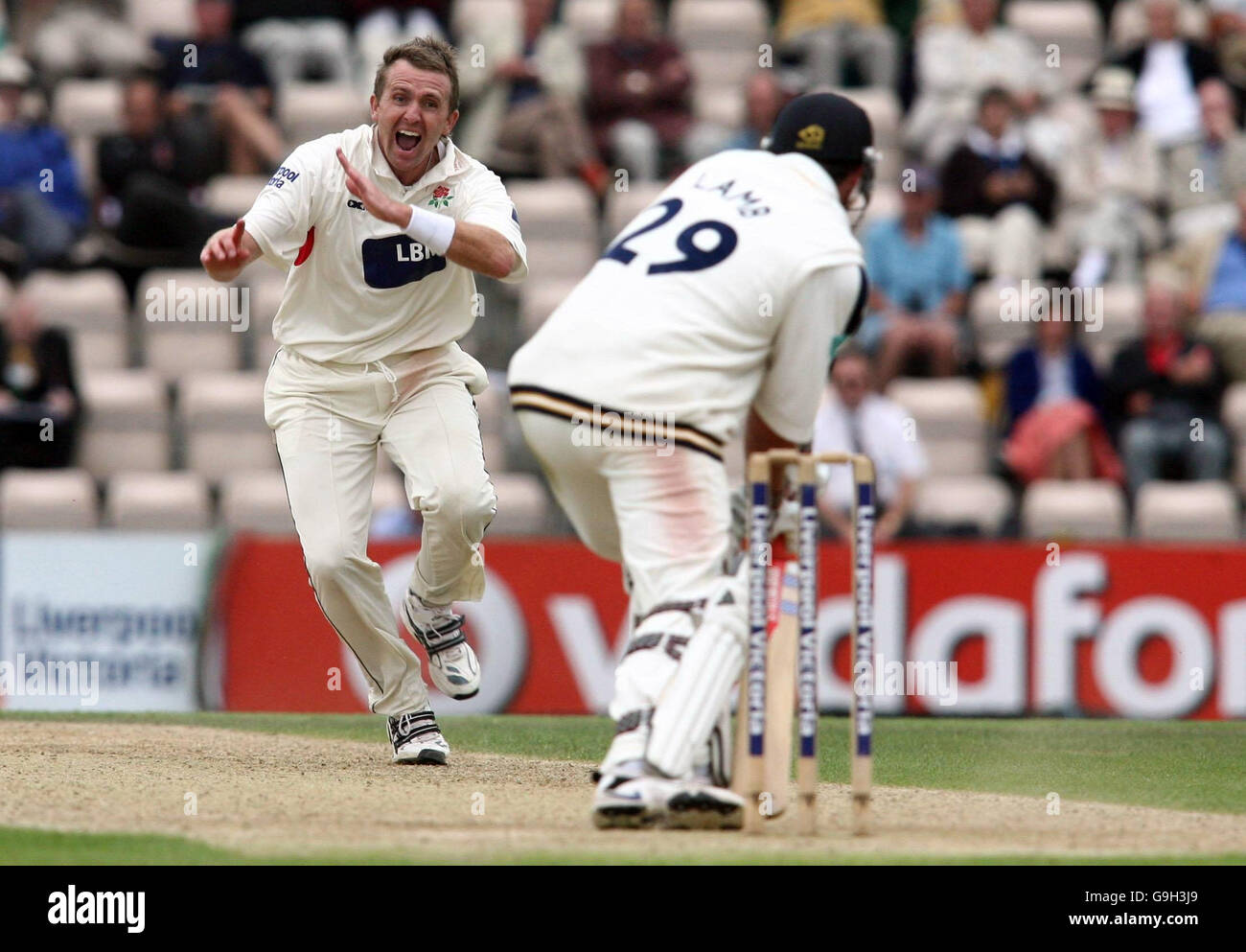 Lancashire's Dominic Cork celebrates trapping Hampshire's Greg Lamb lbw ...