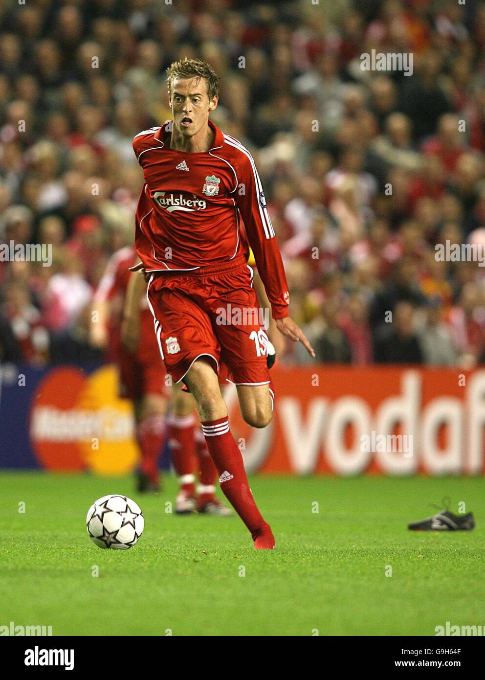 Liverpool plays on despite losing a boot hi-res stock photography and ...