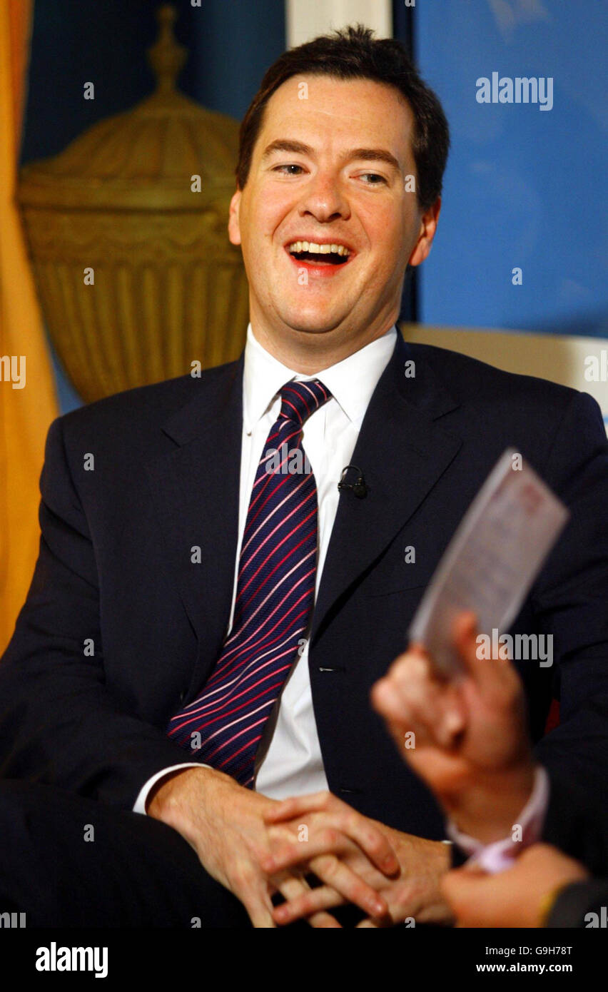 Shadow chancellor George Osborne smiles during a television interview ...