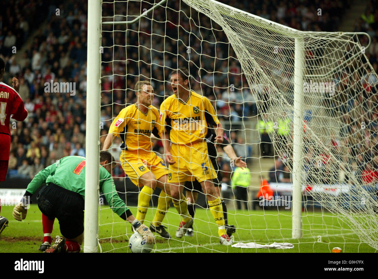 Leyton Orient's Glynn Garner is beaten by Oxford United's Chris ...