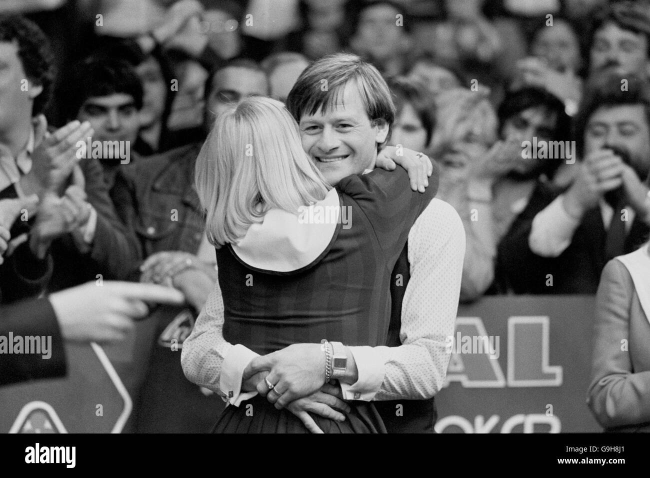 Alex Higgins celebrates his victory in the final with wife Lynn Stock ...