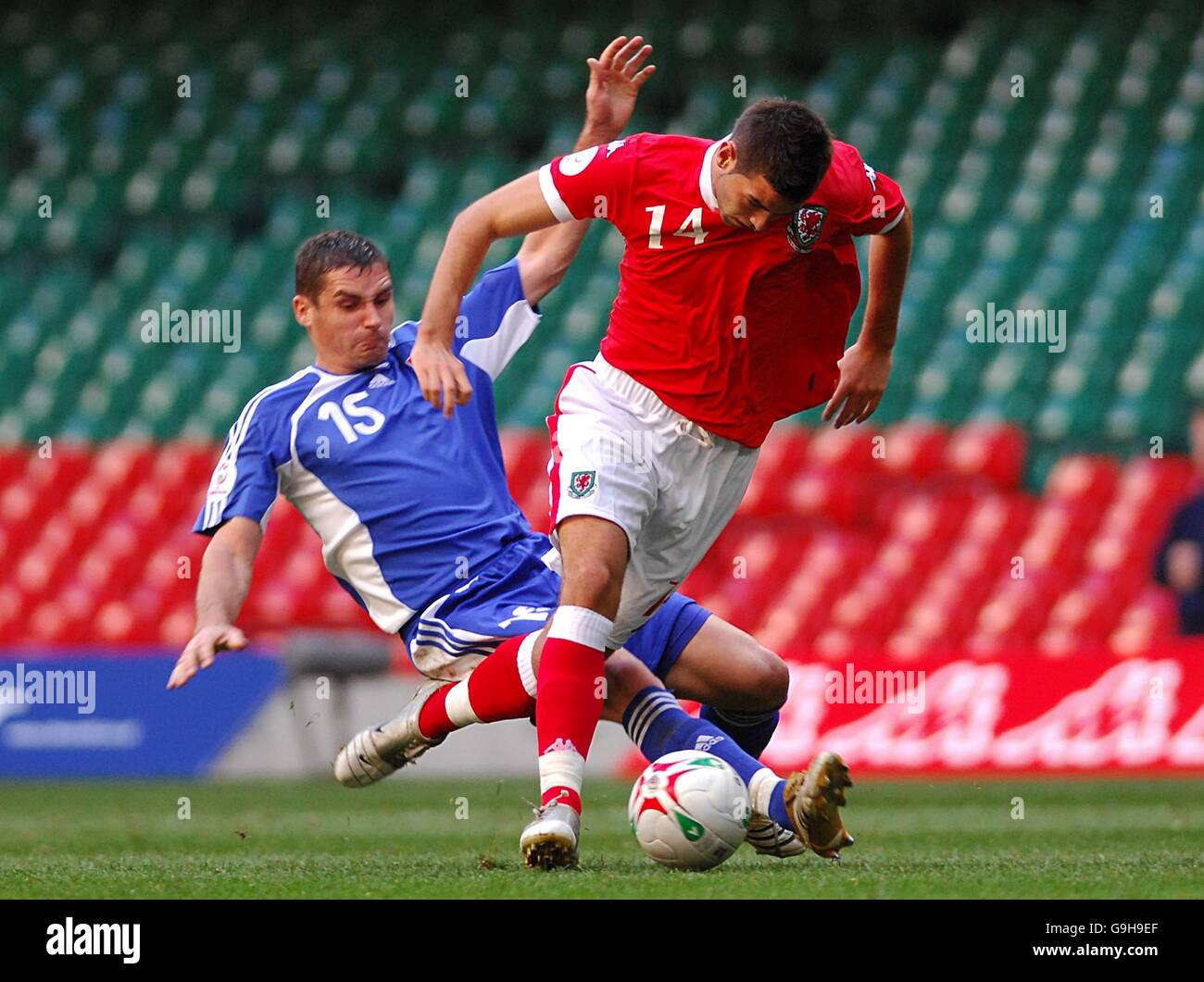 Slovakia's Peter Petras challenges Wales'Joe Ledley for the ball Stock ...