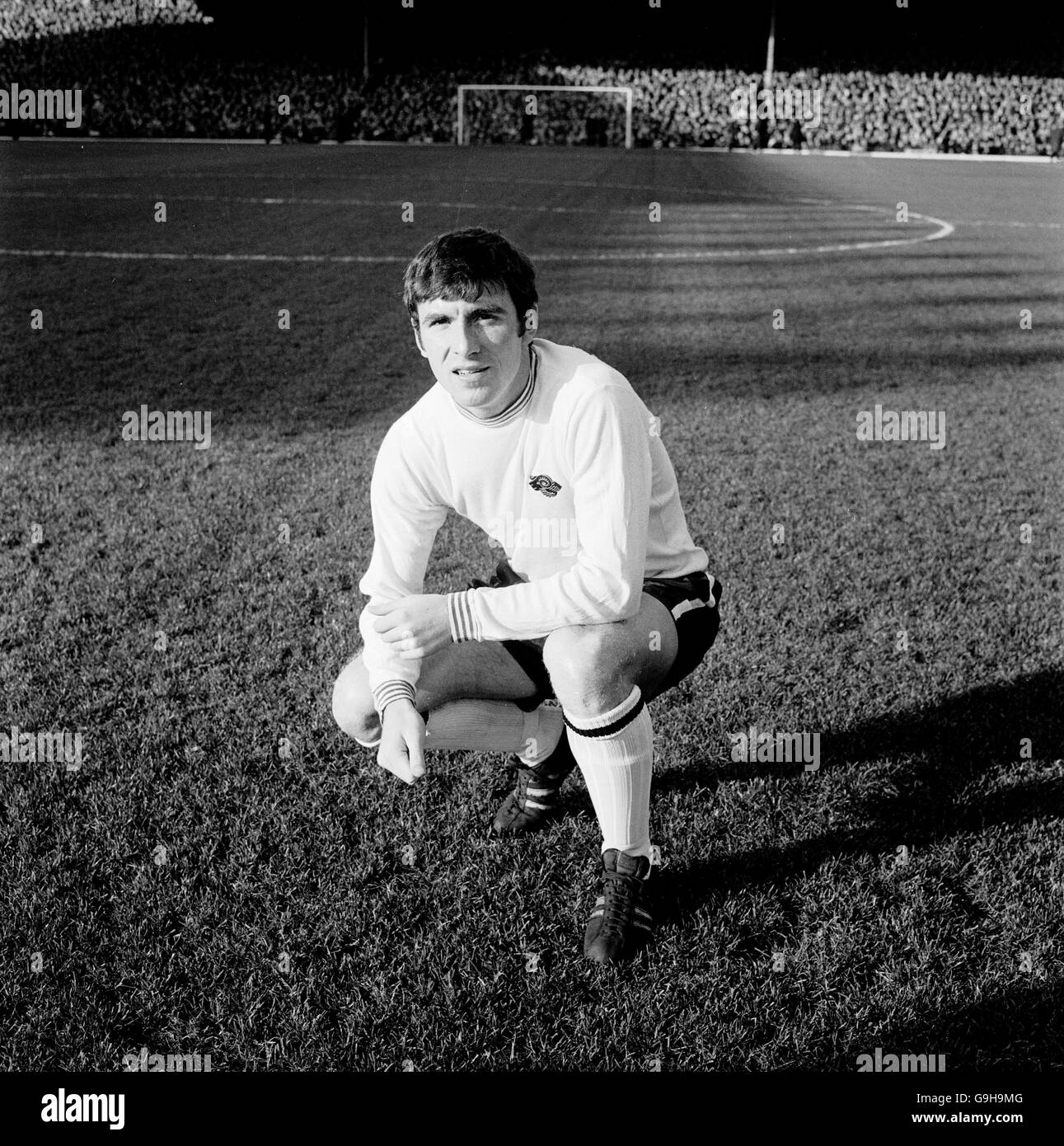 Full length squatting football hi-res stock photography and images - Alamy