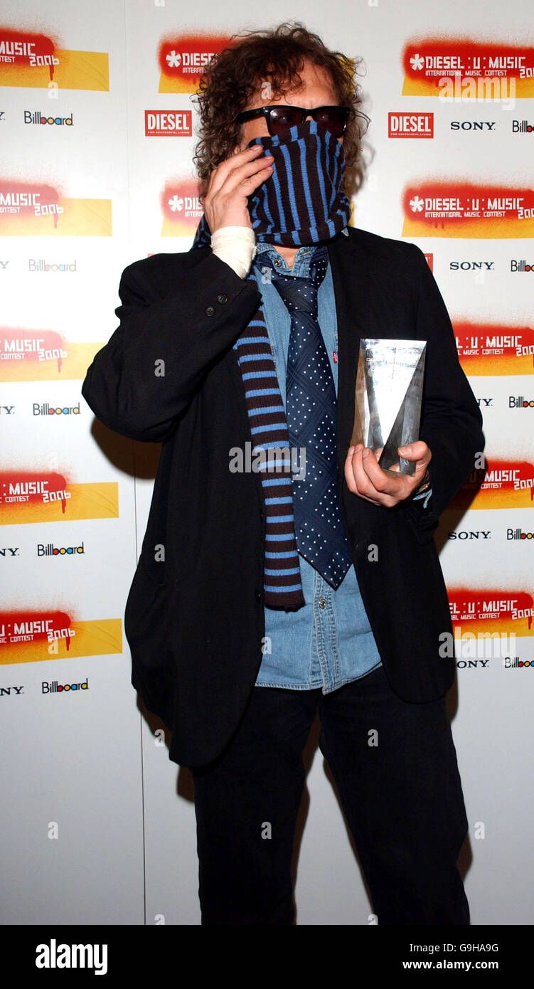 Mick Rock, poses with his Contribution To Music award at the Diesel U ...