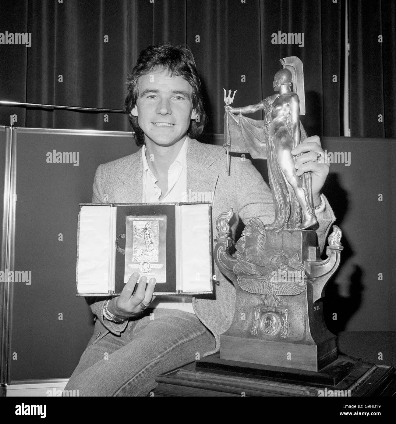 Barry sheene shows off the 1977 segrave trophy hi-res stock photography ...