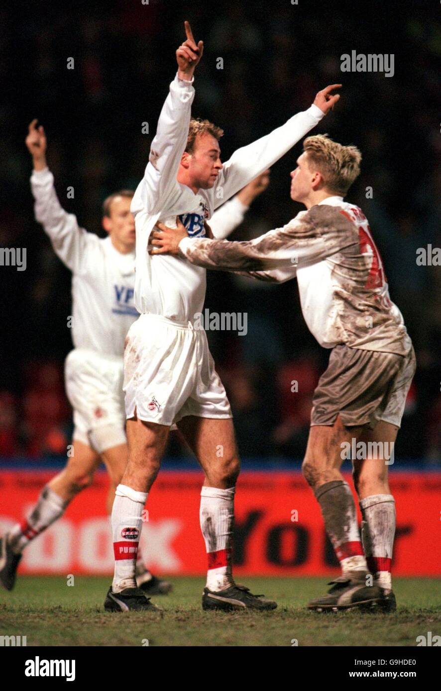 FC Koln's Carsten Cullmann (l) celebrates scoring with teammate Thomas ...