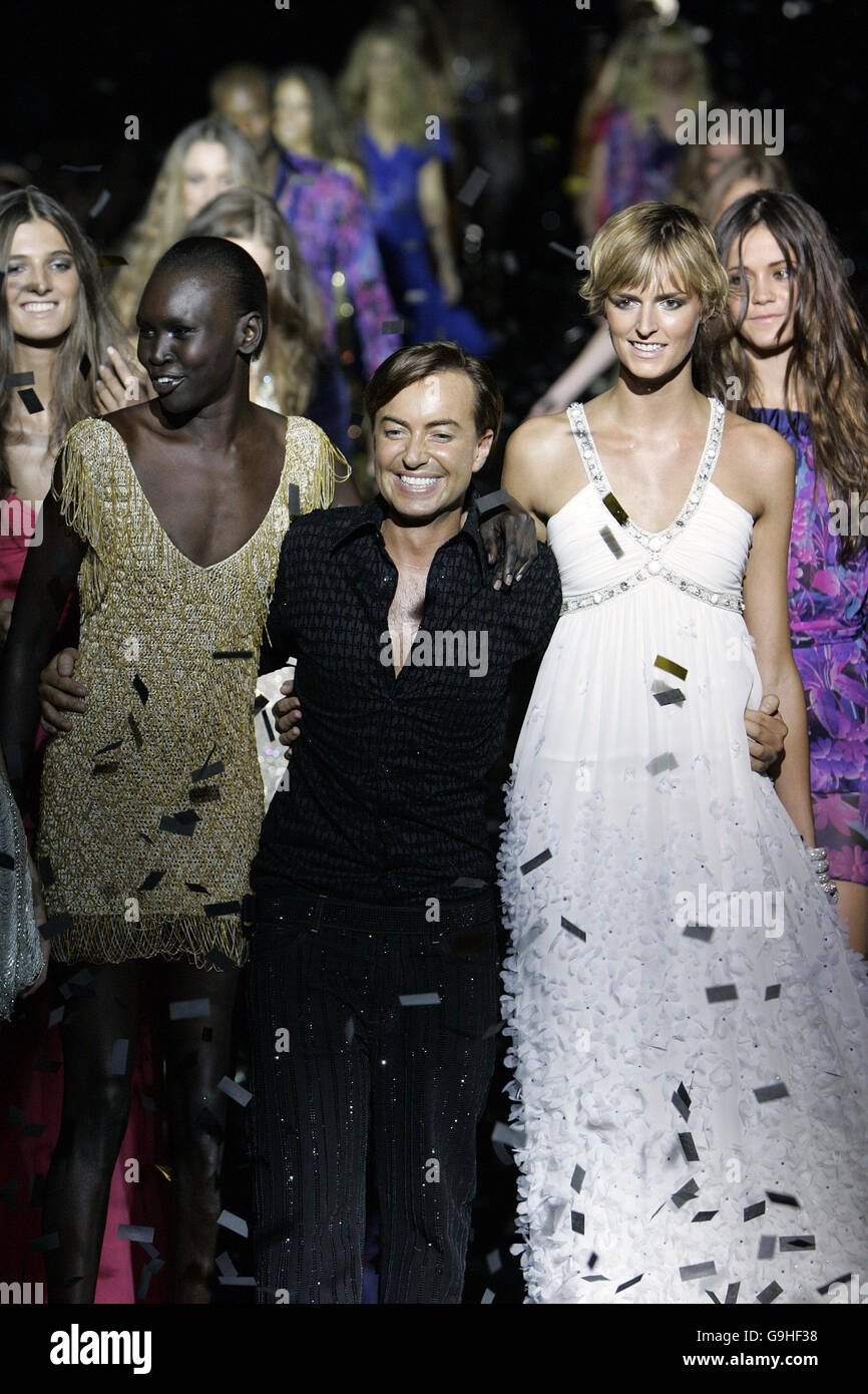 Julien MacDonald with models displaying his designs following his ...