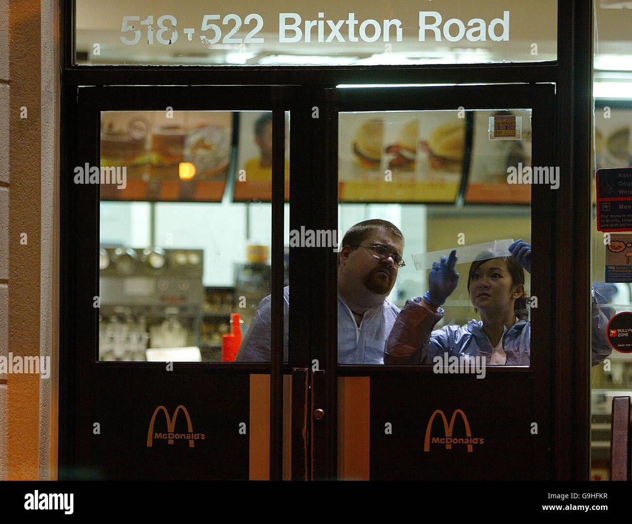 Police forensic officers at mcdonalds restaurant in brixton hi-res ...
