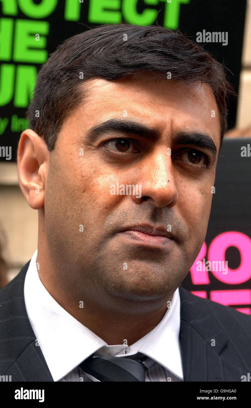 Mr Mirza Amjad Hussain stands outside the Oxford Union Building, where ...
