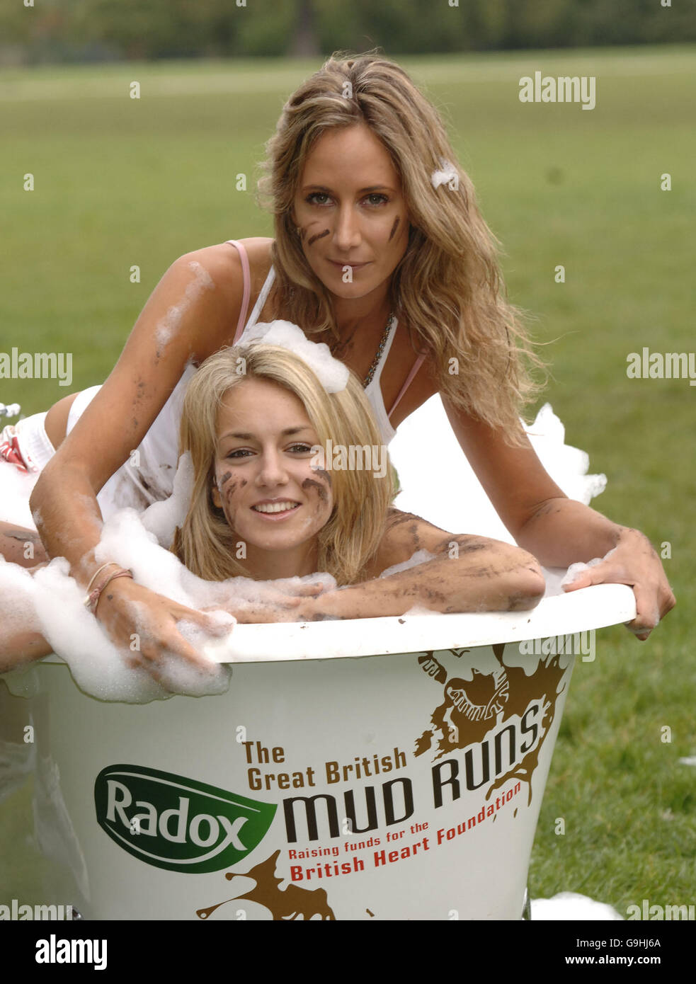 Radox Great British Mud Runs - Hervey sisters - London Stock Photo - Alamy