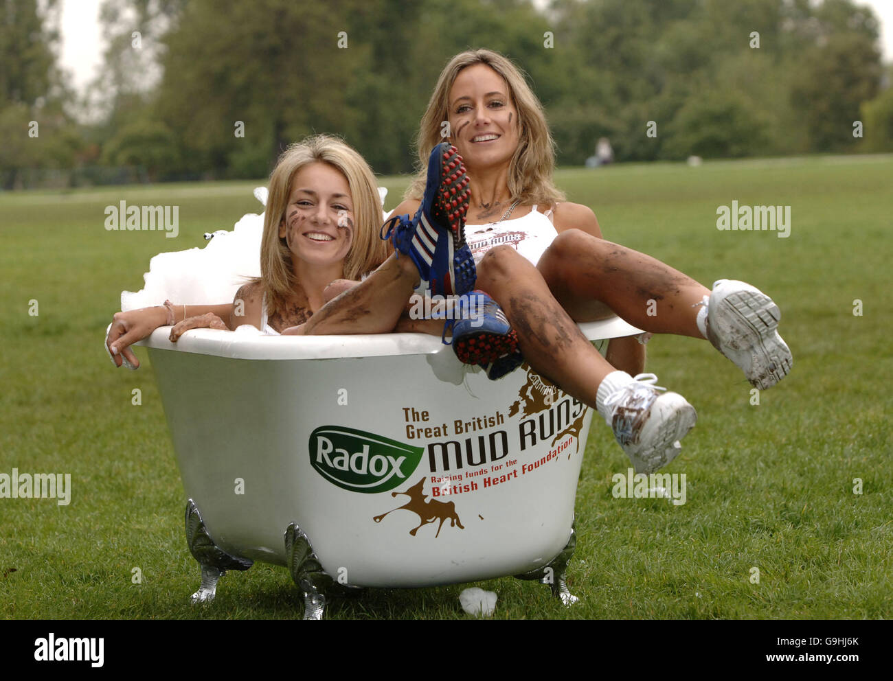 Radox Great British Mud Runs - Hervey sisters - London Stock Photo - Alamy