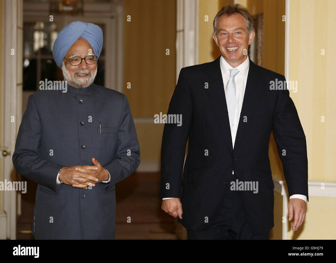 The British Prime Minister Tony Blair walks with his Indian counterpart ...