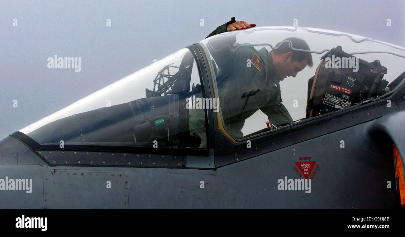 RAF Harrier jet pilot Sammy Sampson slides back the canopy on his GR9 ...