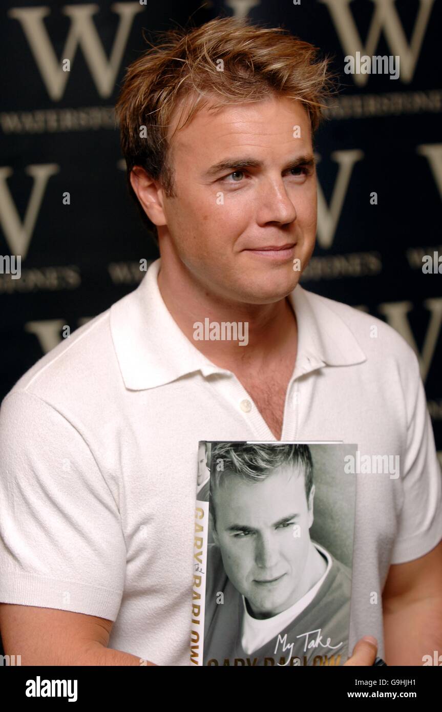 Gary barlow signing hi-res stock photography and images - Alamy