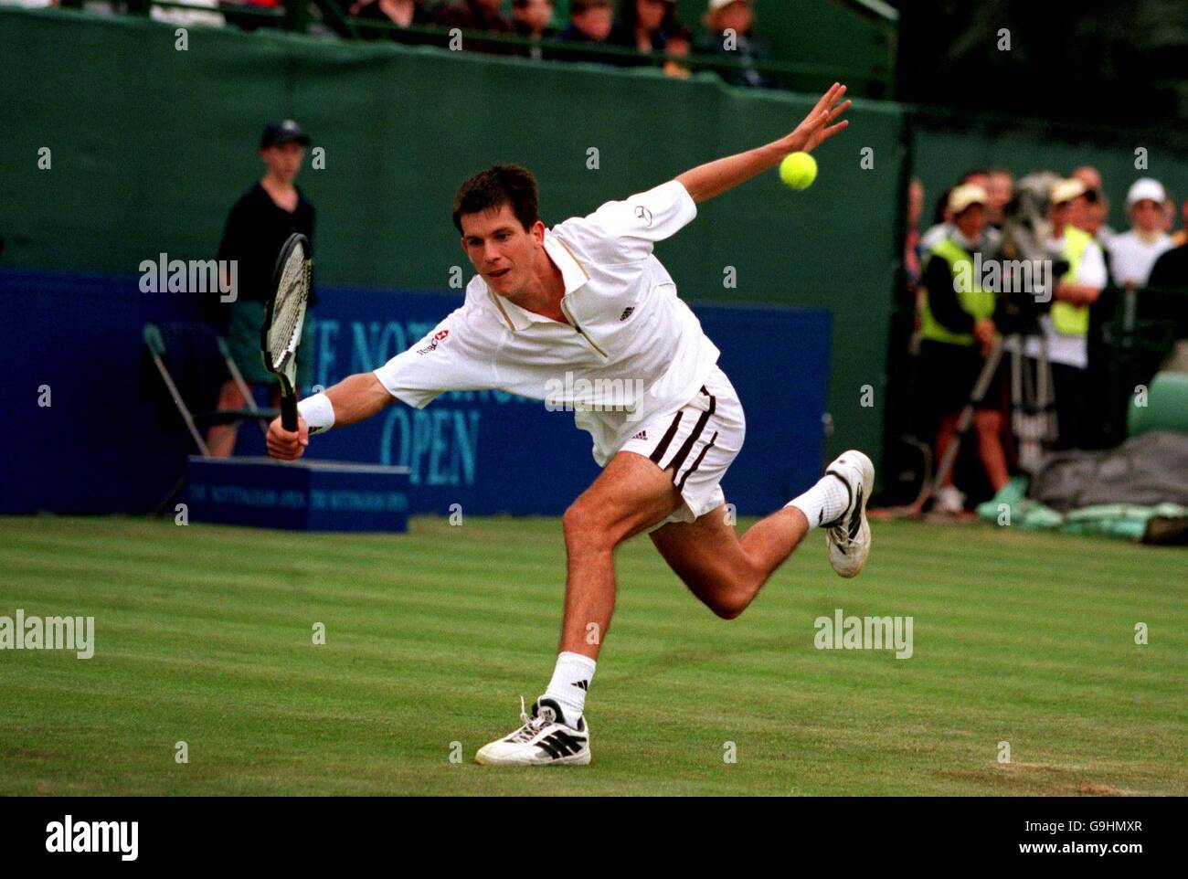 Tim henman stretches for the ball hi-res stock photography and images ...