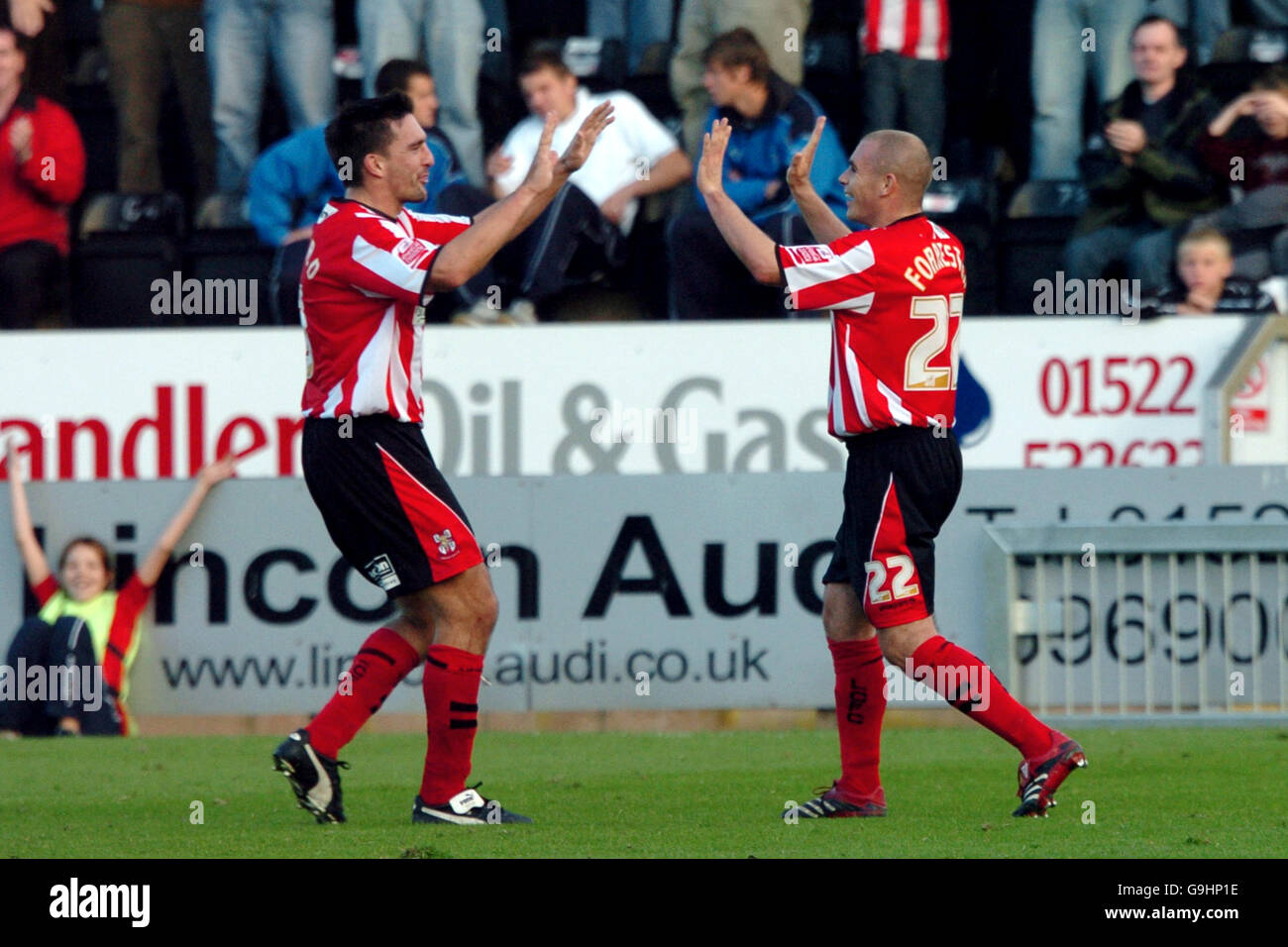 Lincoln citys jamie forrester celebrates scoring with mark stallard hi ...
