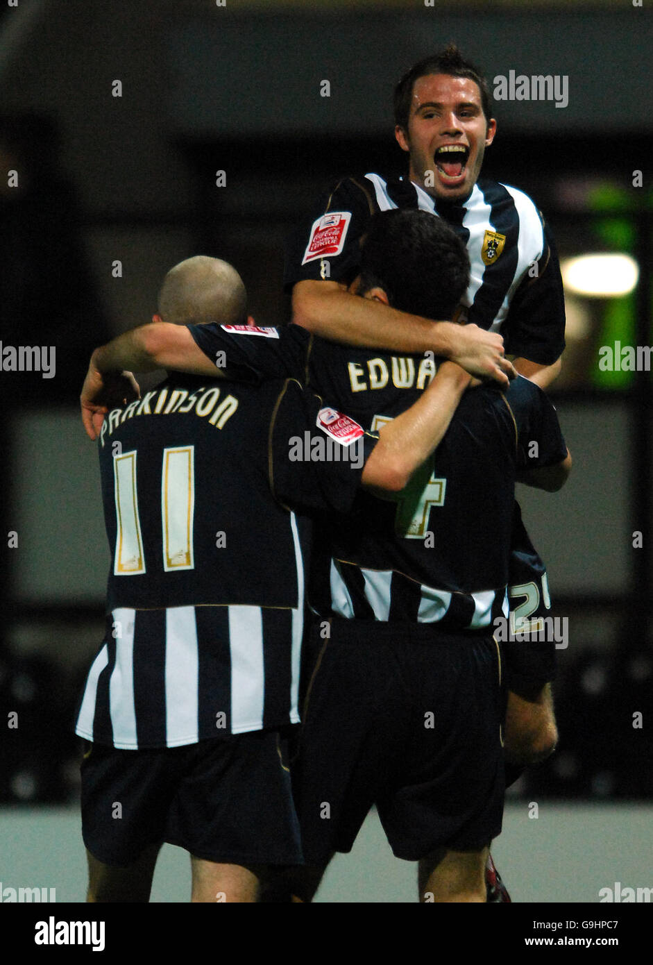 Notts County's Ian Ross congratulates Mike Edwards on scoring the ...
