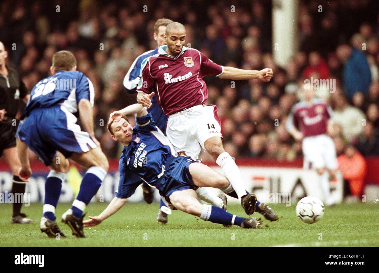 Ipswich towns matt holland tackles west ham uniteds frederic kanoute hi ...