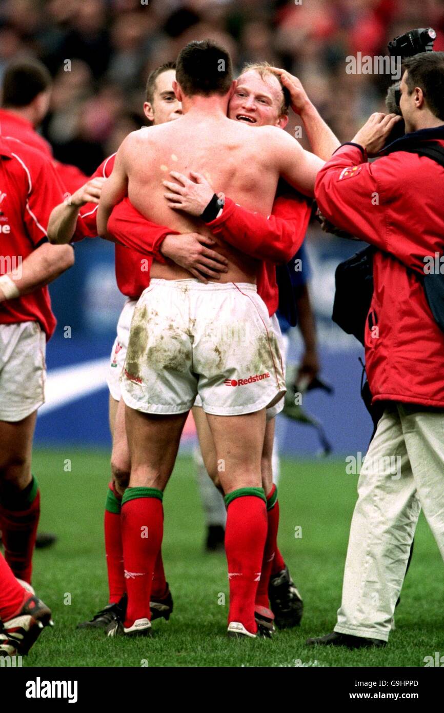 Wales' Neil Jenkins is congratulated by Mark Taylor after Jenkins last ...