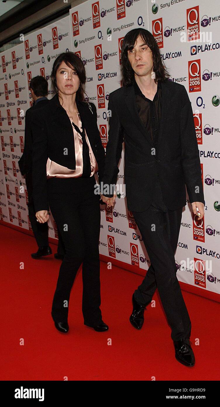 Lead singer of Primal Scream Bobby Gillespie (r) arrives for the Q ...
