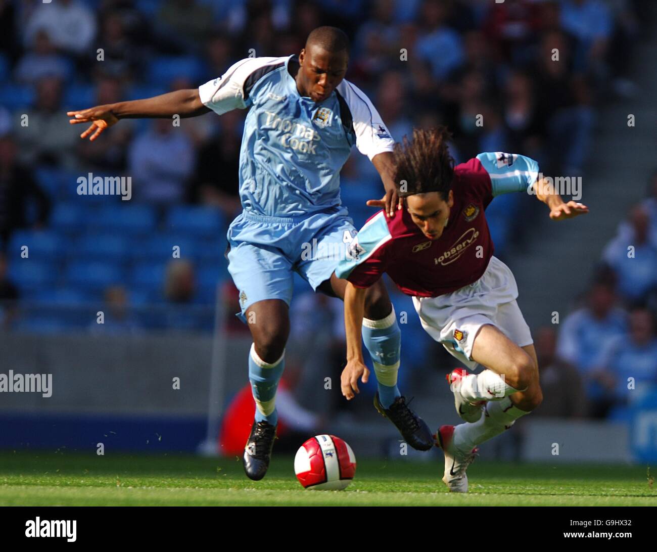 (L-R) Manchester City's Ishmael Miller fouls West Ham United's Yossi ...