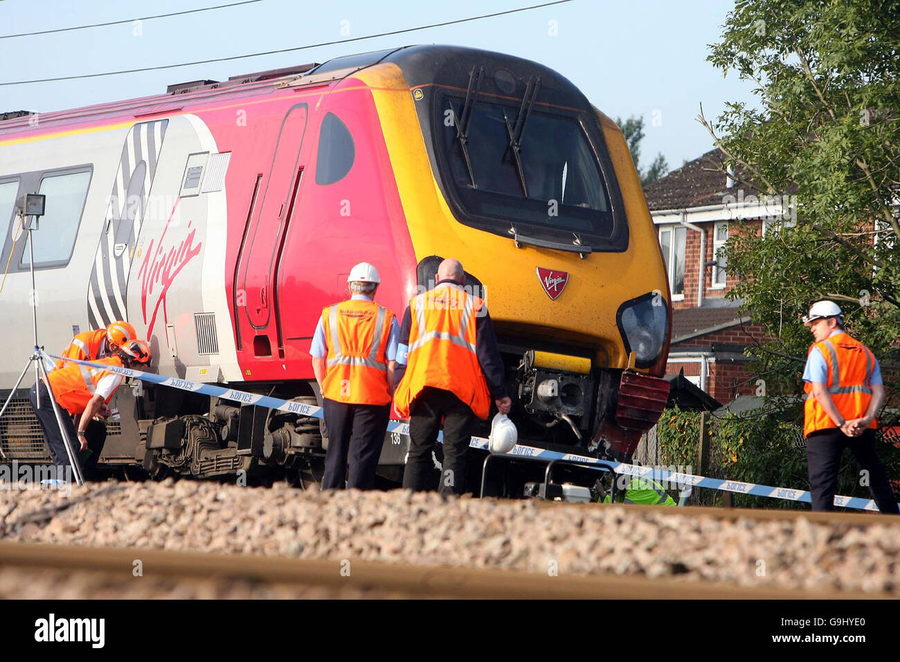 Motorist dies as car hit by train Stock Photo - Alamy