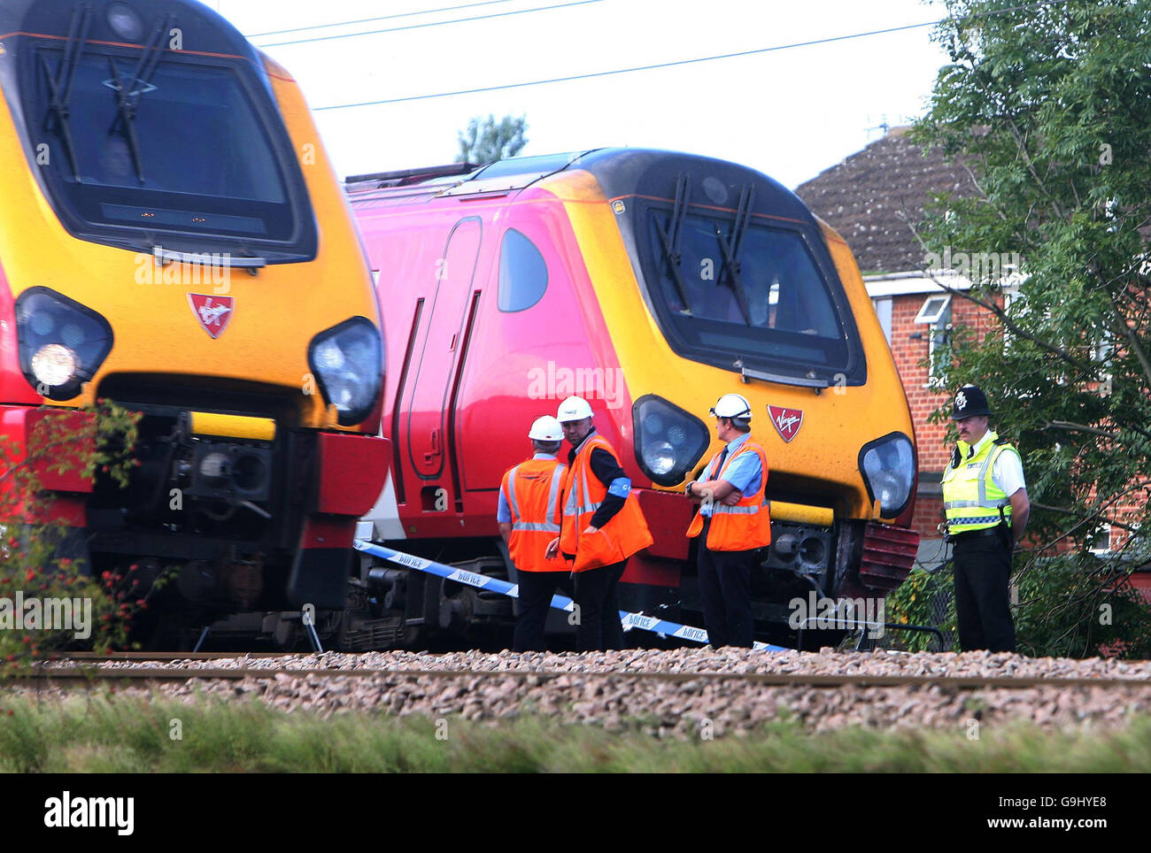 Motorist dies as car hit by train Stock Photo - Alamy