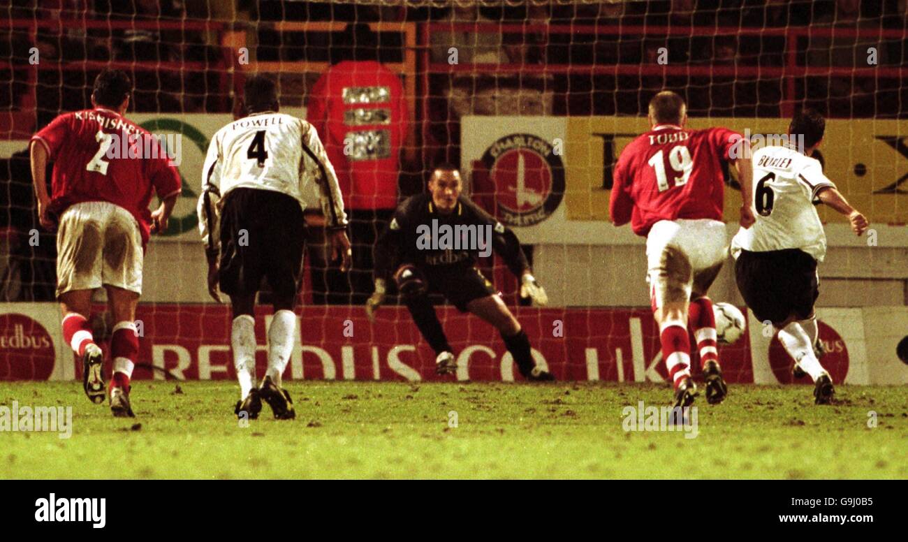 Derby County's Craig Burley (r) has his penalty saved by Charlton ...