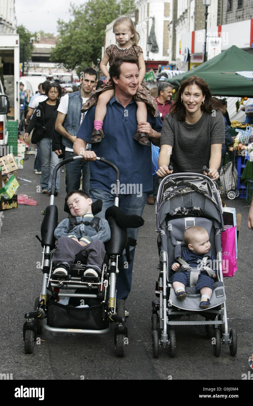 Conservative Party leader David Cameron with his wife Samantha and ...