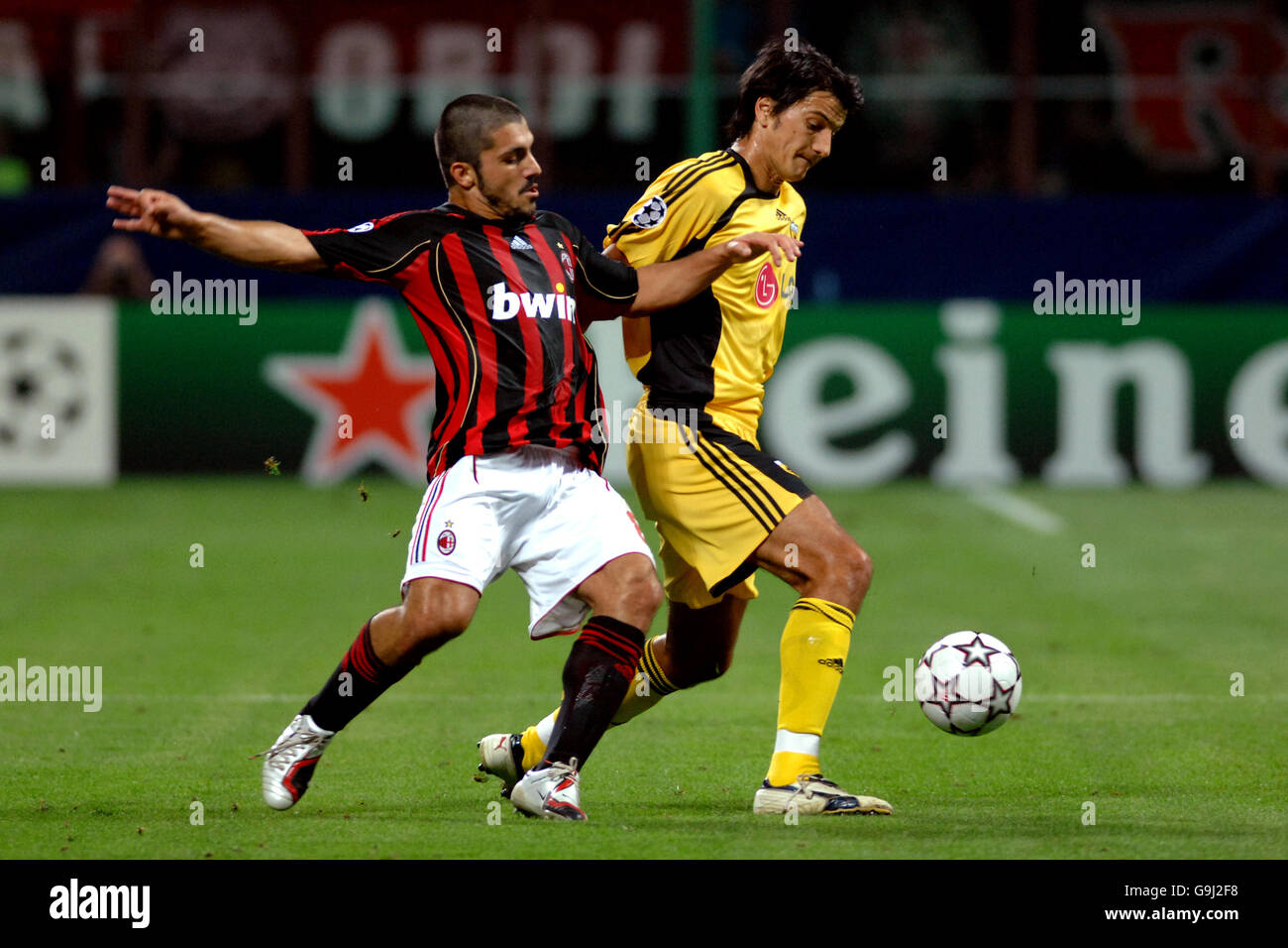 AC Milan's Gennaro Gattuso and AEK Athens' Martin Pautasso battle for ...