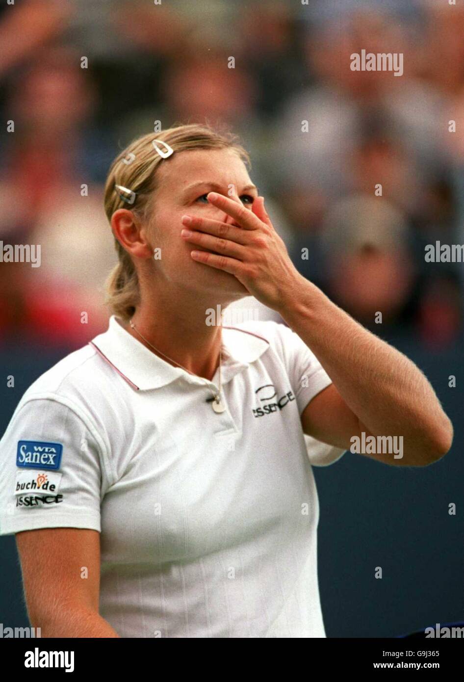Anke huber in action during her match against meilen tu hi-res stock ...
