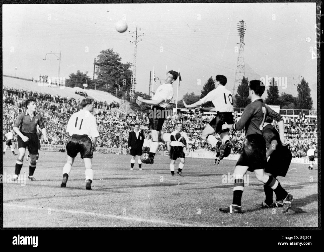England's Tom Finney (second l) turns to see teammate Nat Lofthouse (c ...