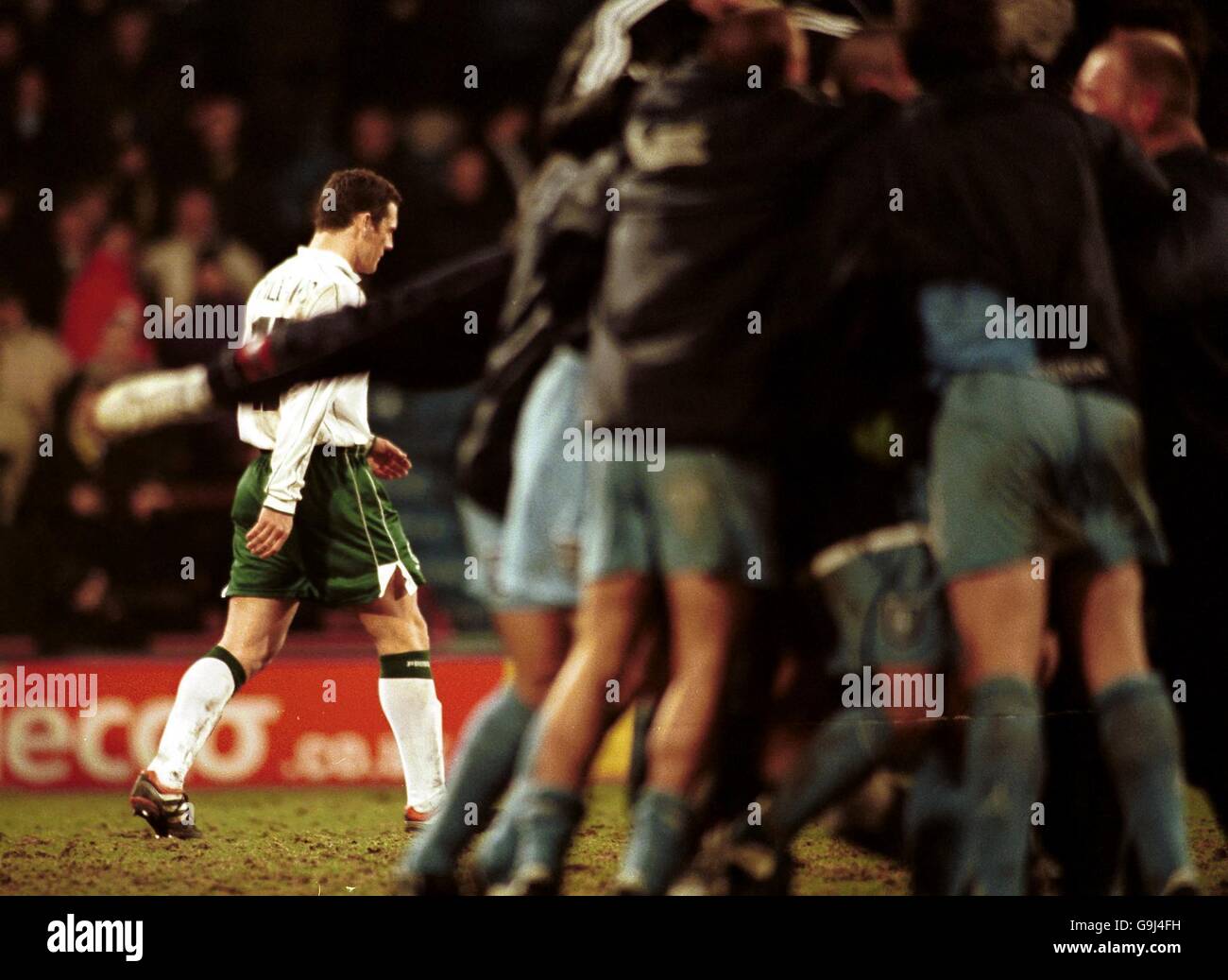 Wimbledon's Mark Williams walks off the pitch after he missed during ...