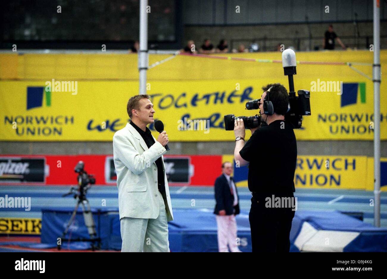 Jon Ridgeon is filmed as he introduces the next event Stock Photo - Alamy